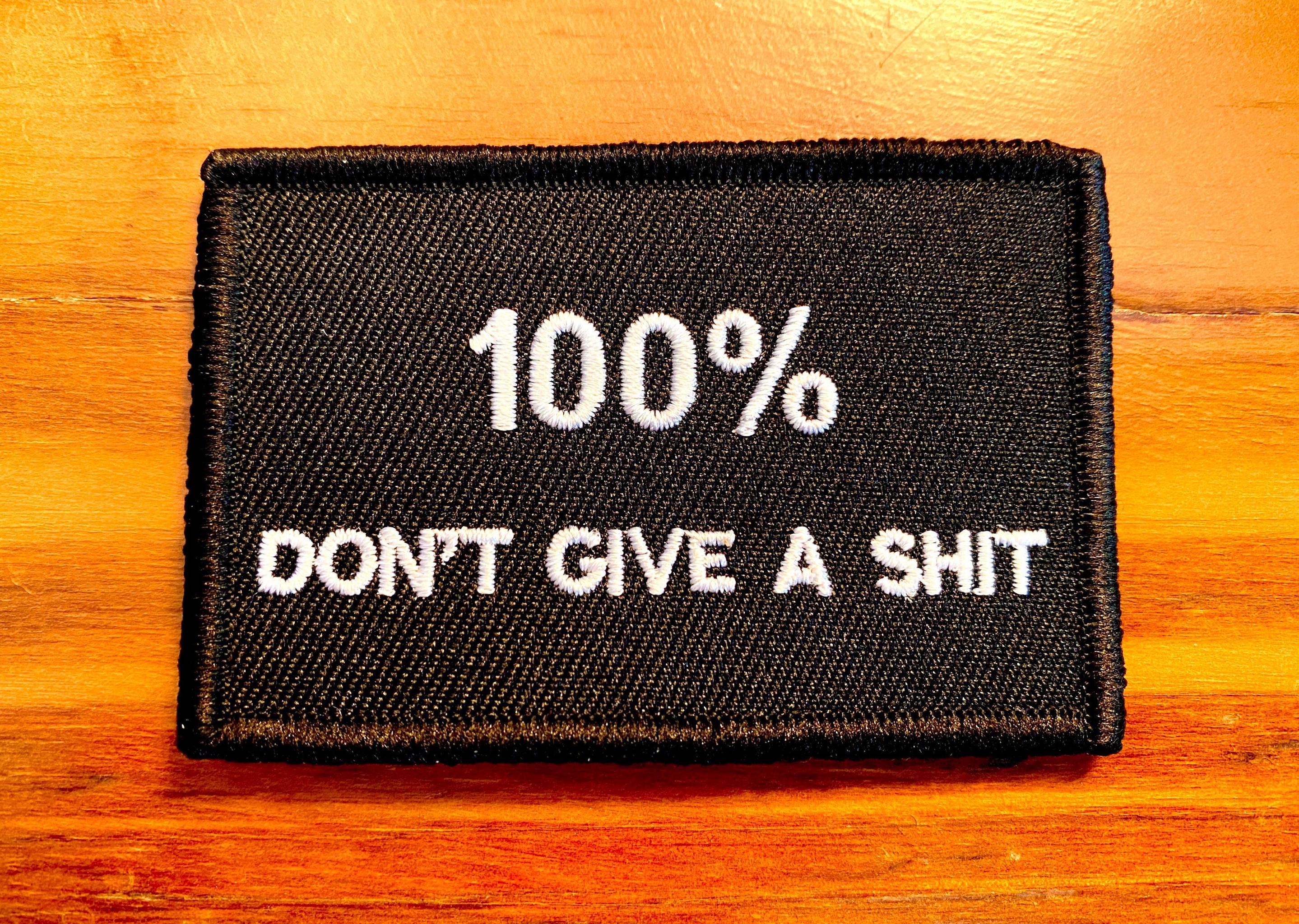 100% - Don't Give A Shit – Cornhole Patch Dude